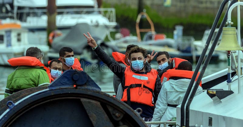 Asylum Seekers Arrive at Dover Docks after Being Rescued at Sea ...