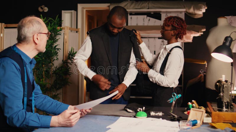 Atelier Client Trying on Jacket Stock Footage - Video of atelier ...