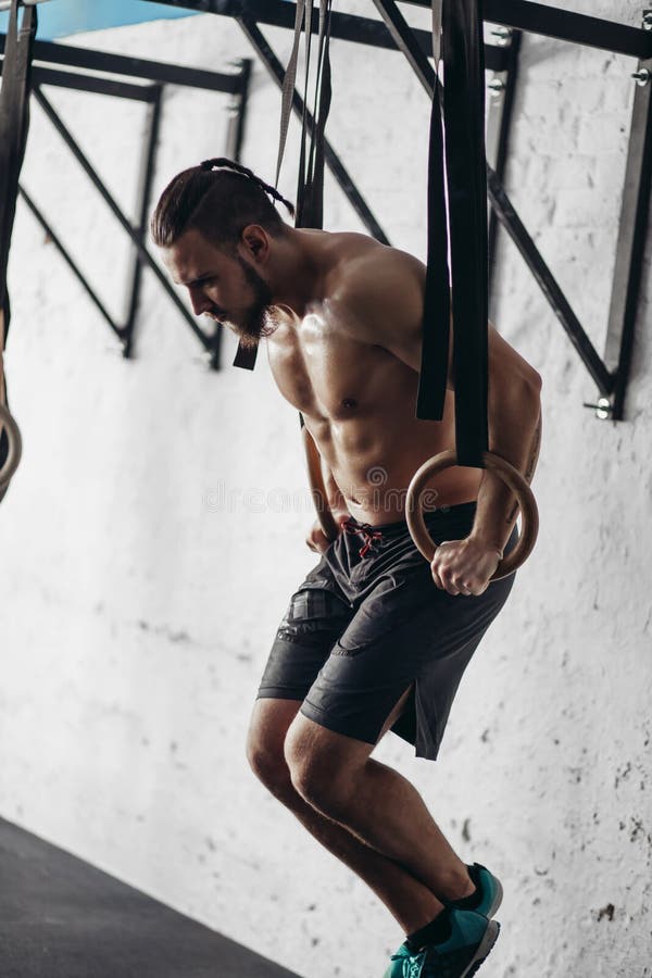 Athlete with Body Excercising in a Gym Stock Photo - Image of fitness ...