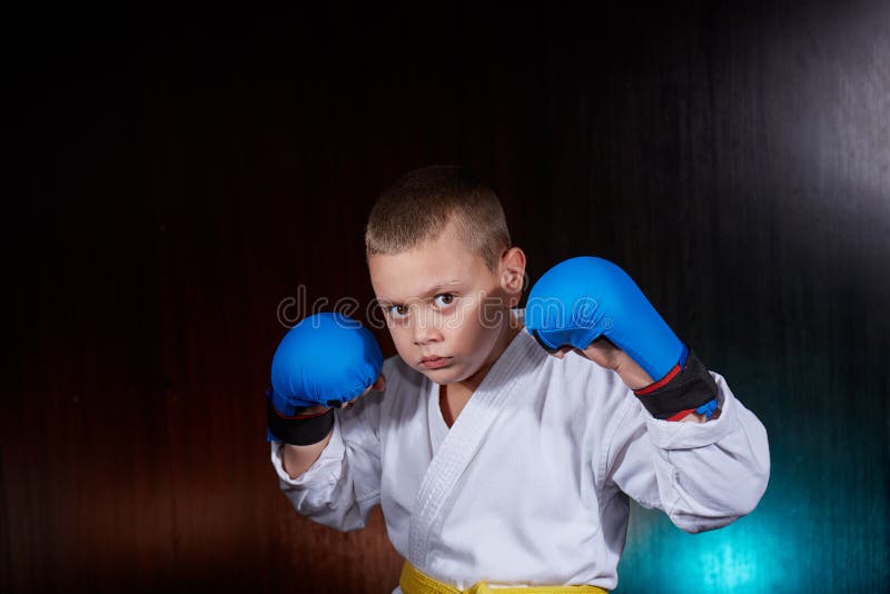 Athlete Boy with Blue Overlays on His Hands Stock Photo - Image of ...