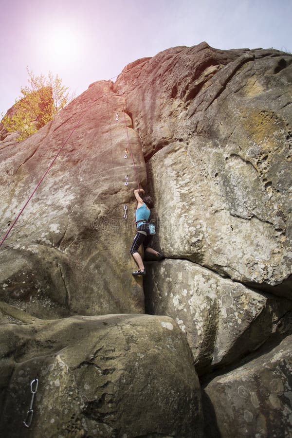 Athlete Climbs on Rock with Rope. Stock Image - Image of athlete ...