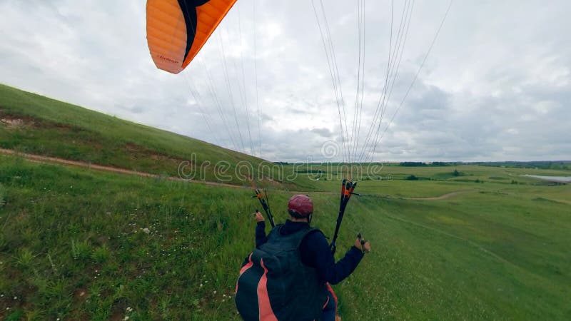 A Person is Flying the Parawing in a Top View Stock Footage - Video of ...