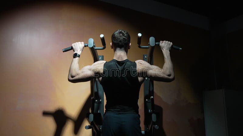 Athlete Do Pullup Workout in Sport Gym, Back View. Sport Athlete with ...