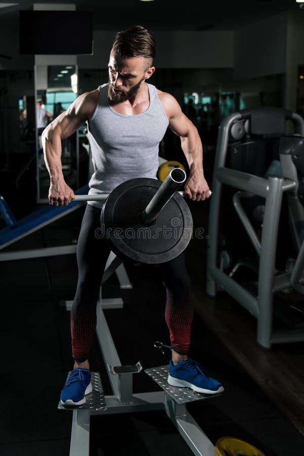Athlete Doing Exercise for Back with Weights Stock Image - Image of ...