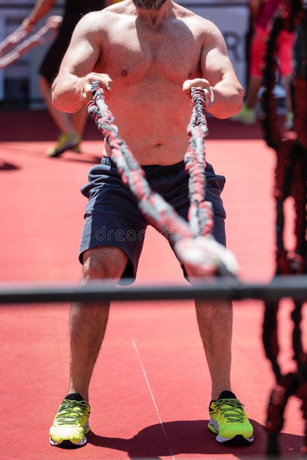 Athlete Doing Fitness Workout Outdoor with Rope Stock Image - Image of ...