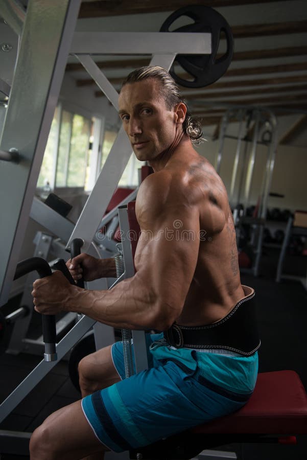 Athlete Doing Heavy Weight Exercise for Back Stock Photo - Image of ...