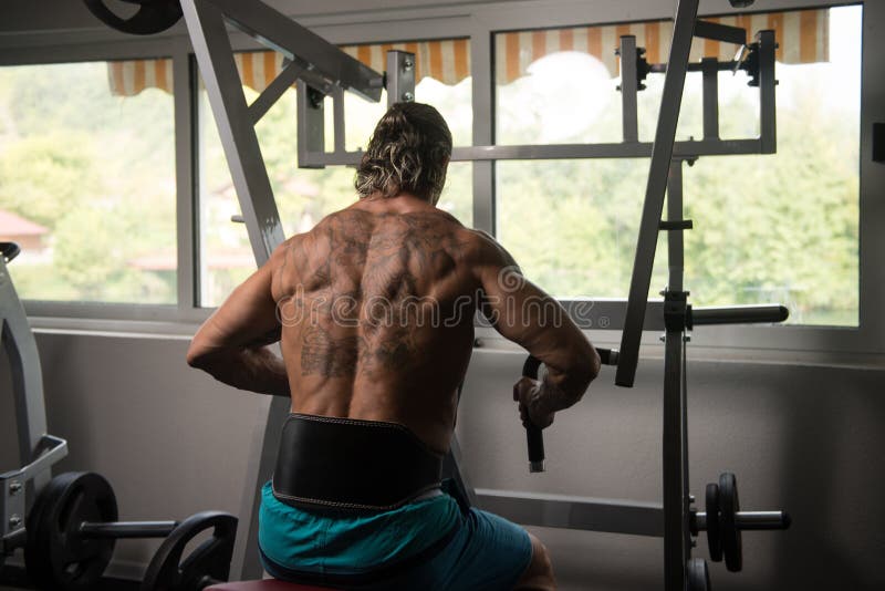 Athlete Doing Heavy Weight Exercise for Back Stock Image - Image of ...