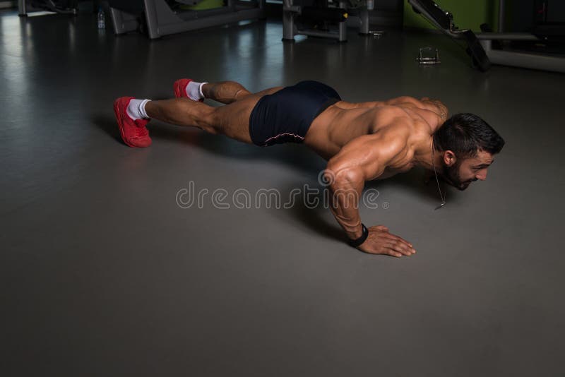Model Exercising Push Ups stock photo. Image of bodybuilding - 100360354