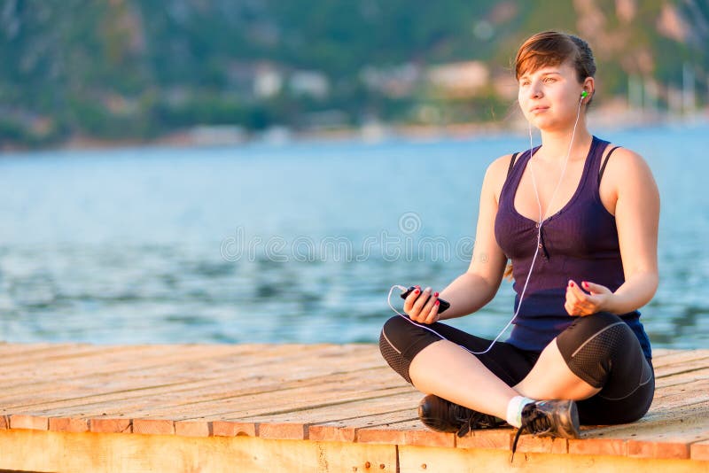 Athlete Doing Yoga on the Pier Stock Photo - Image of relax, athlete ...