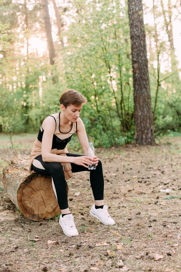 Athlete Drinks Water Outside Running Forest Path Stock Photo - Image of ...