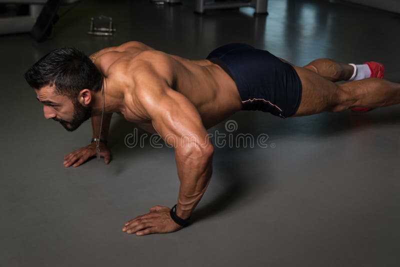 Athlete Exercising Push Ups Stock Image - Image of physique, diet ...