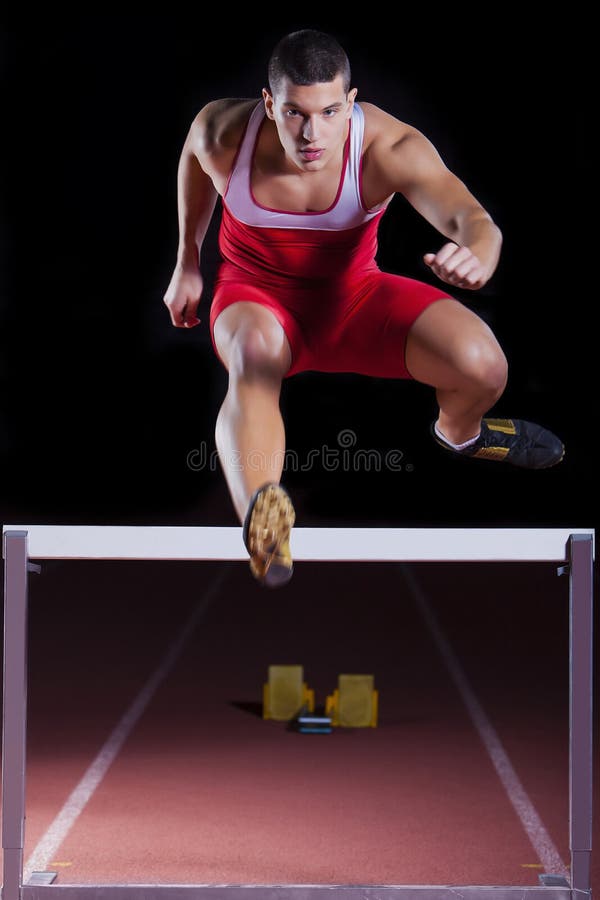 Athlete on Hurdle in Track and Field Stock Photo - Image of leisure ...