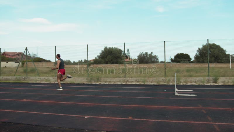 Athlete Jumping Obstacles in the Race Track Stock Video - Video of ...