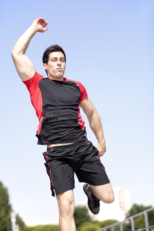 Athlete Jumping at the Park Stock Image - Image of outdoors, motivation ...