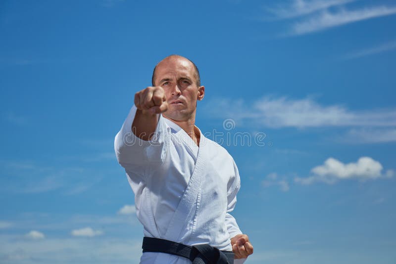 Athlete Karategi Beats Punch Hand Blue Sky Background Stock Photos ...