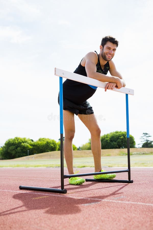 Athlete Leaning on the Huddle Stock Image - Image of running, runner ...