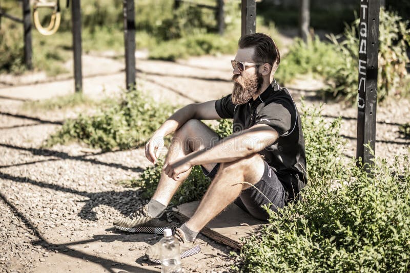Athlete Young Man Resting after Workout Outdoors Stock Image - Image of ...