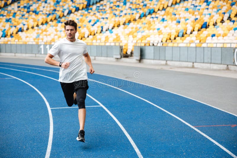 Athlete Man Running on a Racetrack Stock Photo - Image of people, body ...