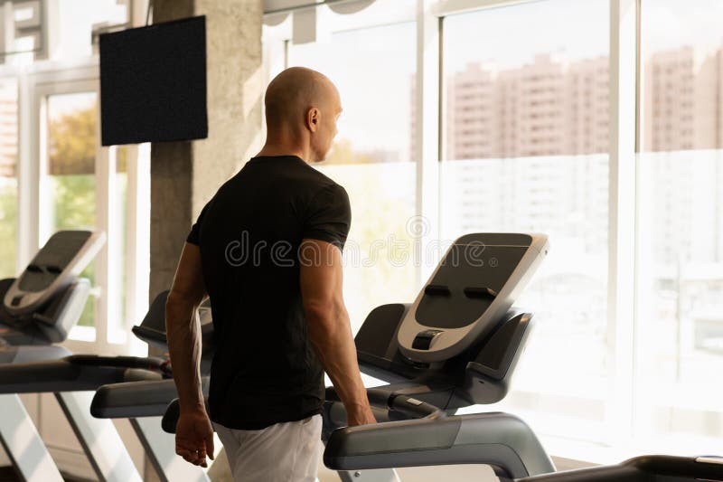 Athlete Man Walking on Running Track, Warming Up on Gym Treadmill ...