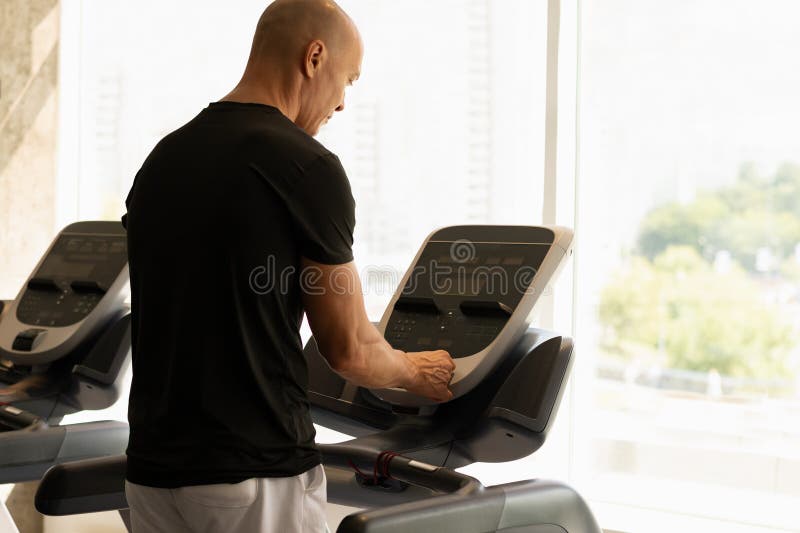 Athlete Man Walking on Running Track, Warming Up on Gym Treadmill ...