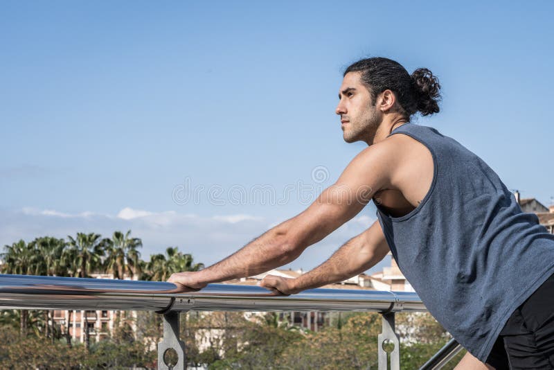 Athlete Men Stretching Muscles after Power Exercise Stock Image - Image ...