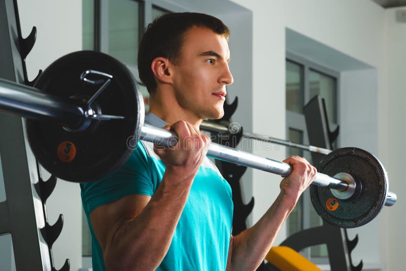 Athlete Muscular Bodybuilder in the Gym Training with Bar Stock Photo ...