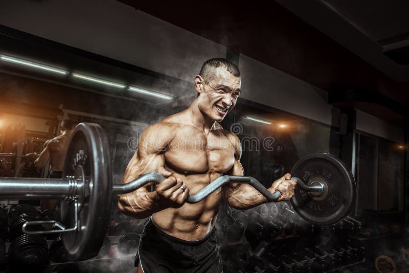 Athlete Muscular Bodybuilder in the Gym Training with Bar Stock Image ...