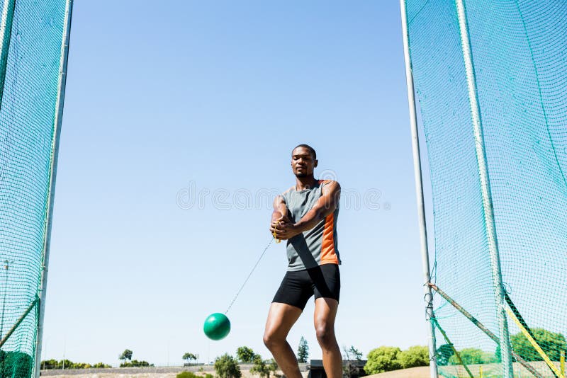 Athlete Performing a Hammer Throw Stock Image - Image of athlete, sunny ...