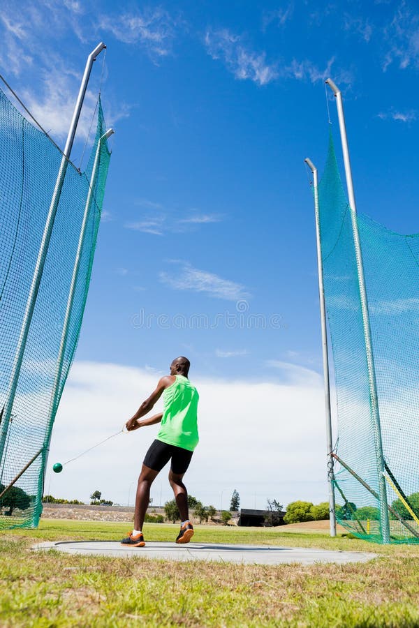 Athlete Performing a Hammer Throw Stock Photo - Image of effort ...