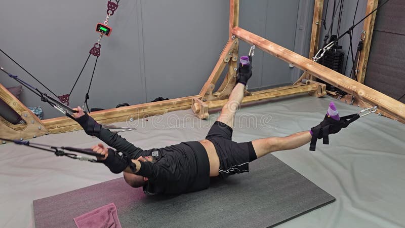Athlete Performing Suspension Training Exercises in Gym Stock Video - Video of coordination ...
