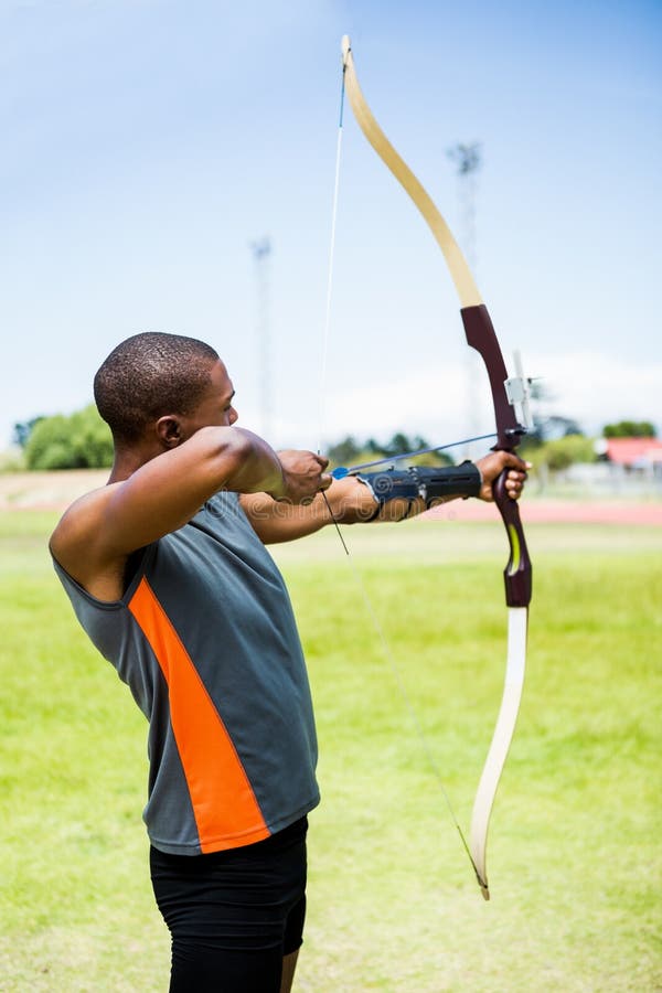 Athlete practicing archery stock photo. Image of precision - 77654174