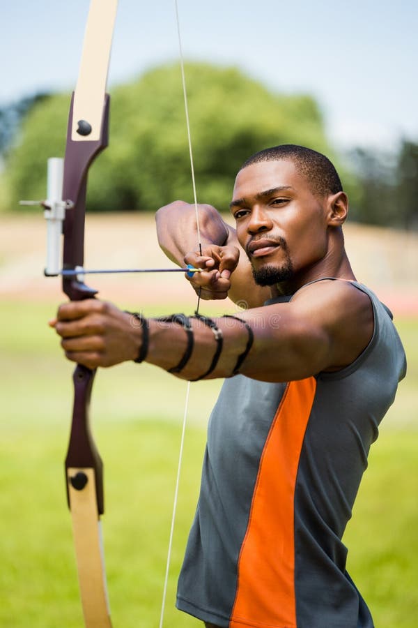 Athlete practicing archery stock image. Image of archery - 77655829