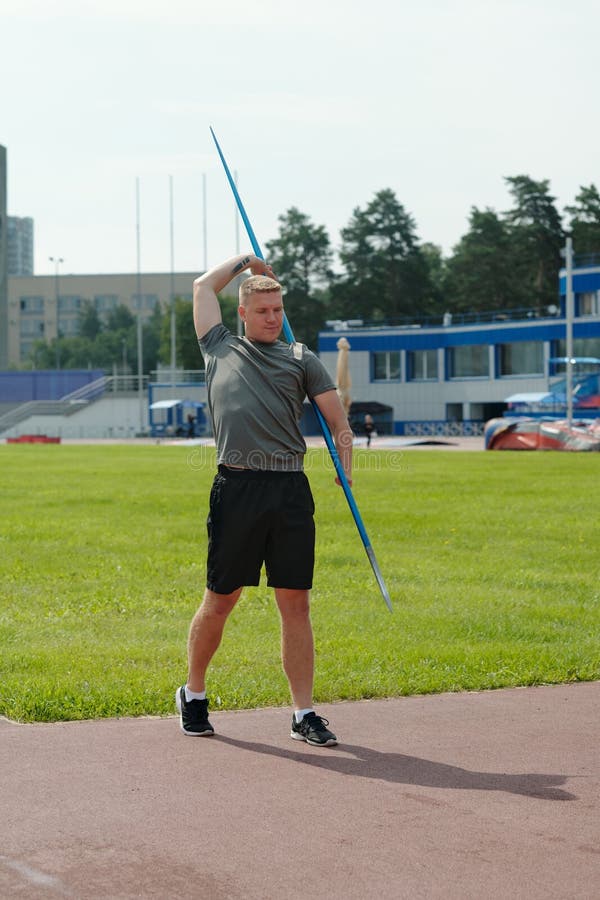 Athlete Practicing Javelin Throw on Sports Field Stock Photo - Image of ...