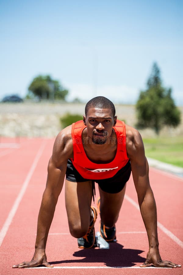 Athlete ready to run stock photo. Image of race, determination - 77654338