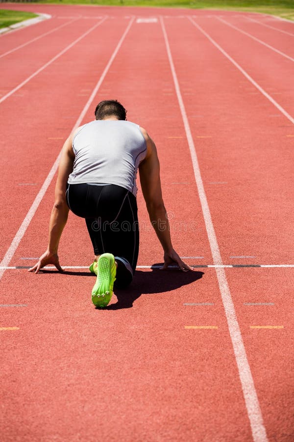 Athlete ready to run stock photo. Image of hispanic, shoe - 77654666