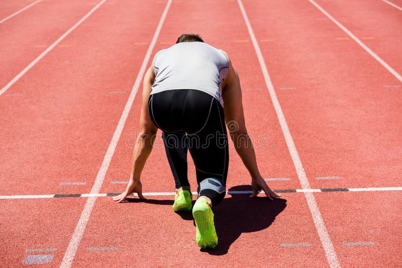 Athlete ready to run stock photo. Image of athleticism - 77654704