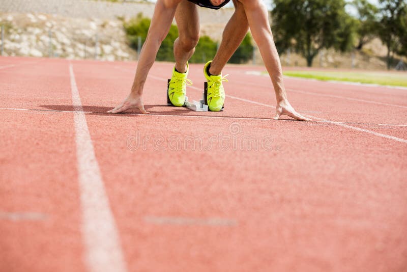 Athlete ready to run stock image. Image of focused, position - 74033961