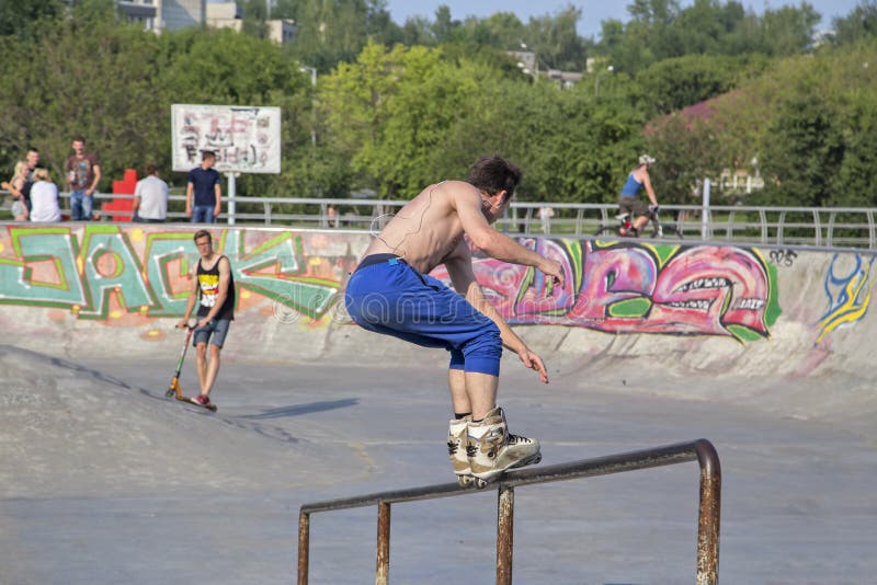 The Athlete on Rollers Carries Out a Trick Editorial Stock Photo ...