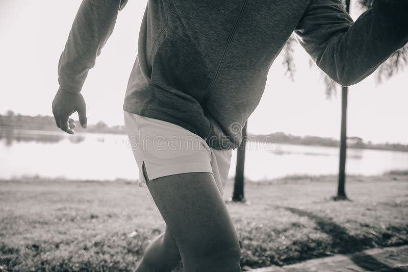 Athlete Runner Feet Running on Road, Jogging Concept at Outdoors. Man ...