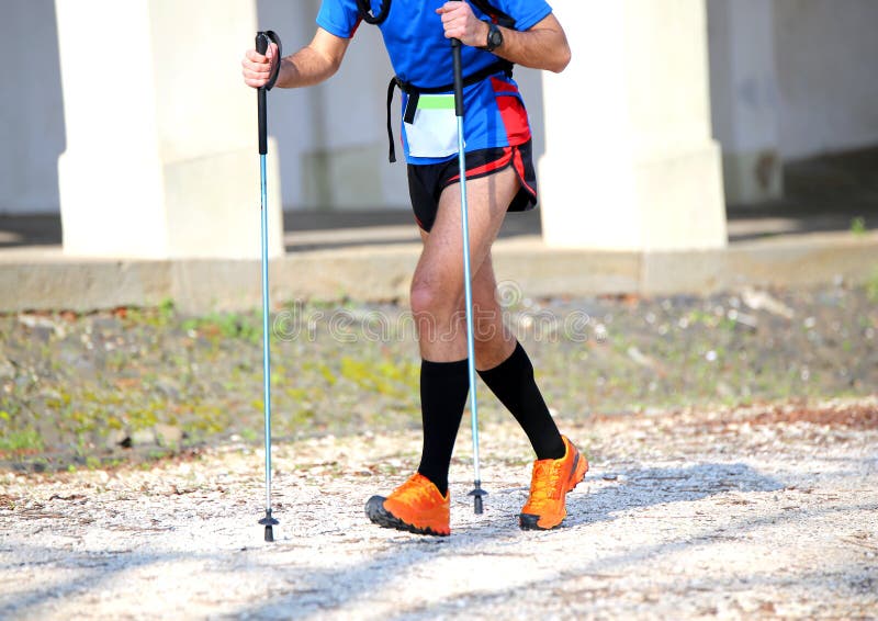 Athlete Runner during the Nordic Walking Training with the Nordi Stock ...