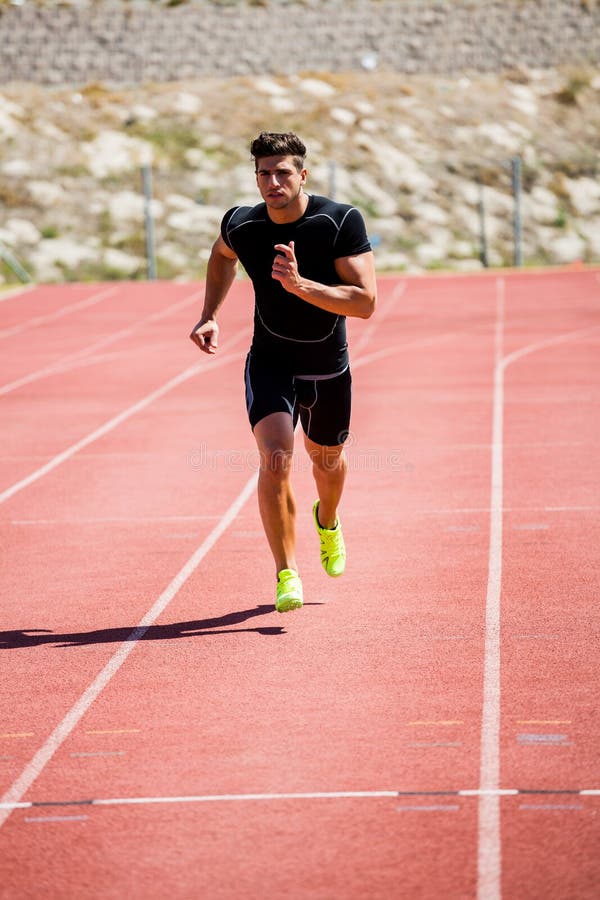 Athlete Running on the Racing Track Stock Photo - Image of energetic ...