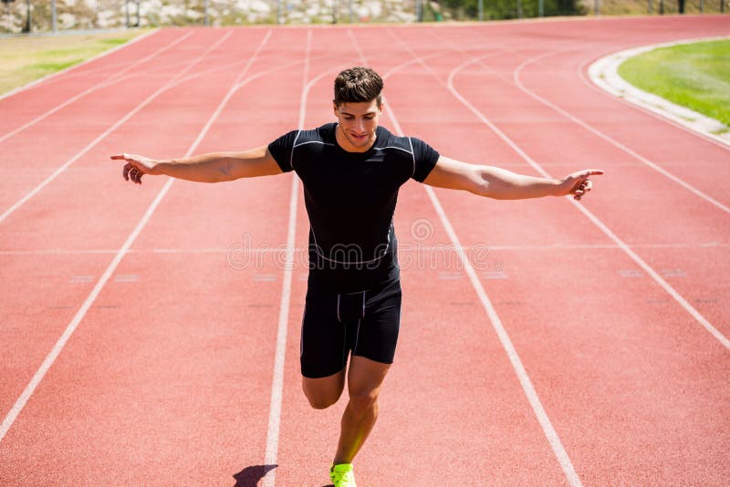 Athlete Running on Running Track Stock Photo - Image of stadium ...