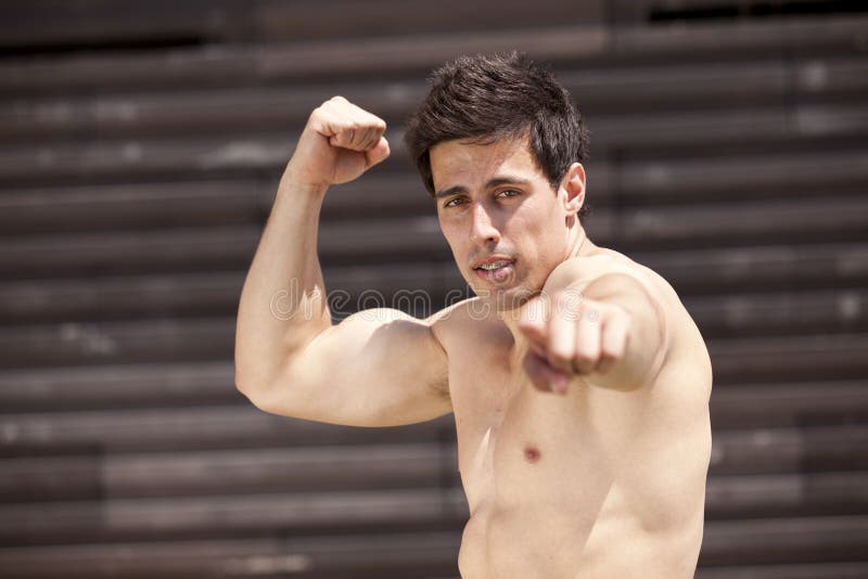 Athlete Showing His Muscles Stock Photo - Image of biceps, handsome ...