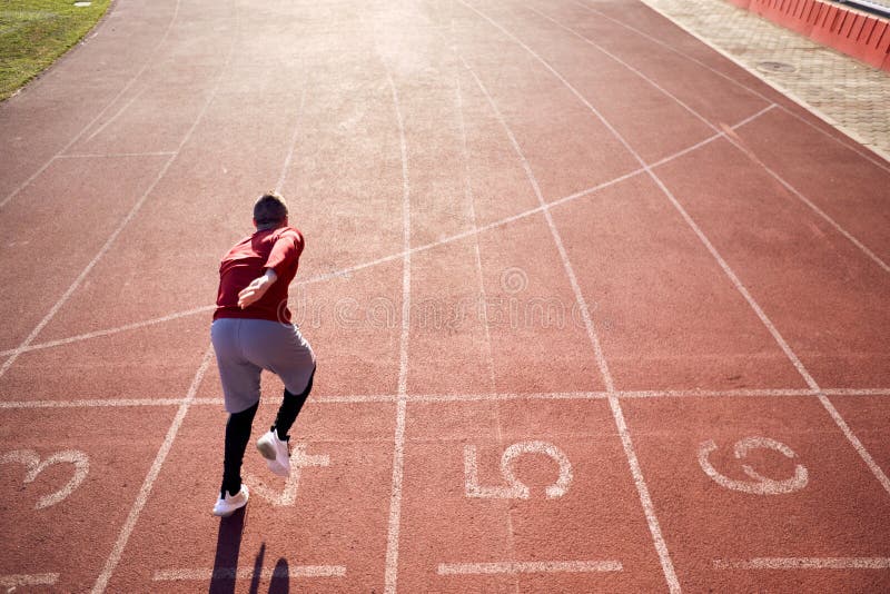 Athlete Start at Run Track. Big Copy Space Stock Image - Image of alone ...