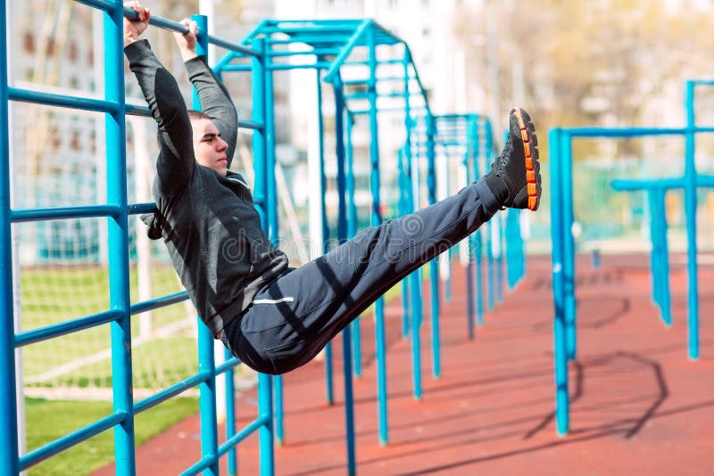 Athlete Swings the Press on Horizontal Bar Stock Photo - Image of goal ...
