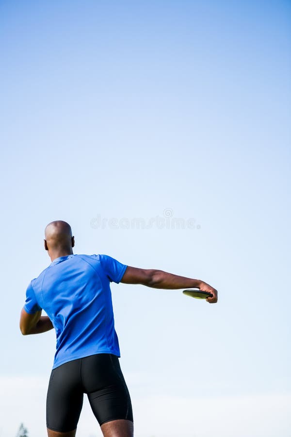 Athlete about To Throw a Discus Stock Photo - Image of strength, power ...