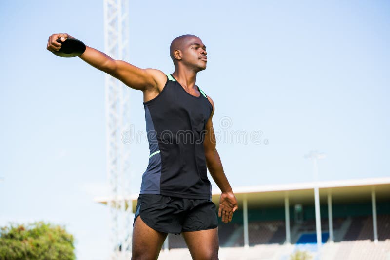 Athlete about To Throw a Discus Stock Image - Image of strength ...