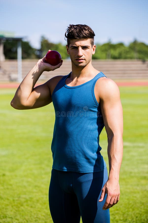 Male Athlete about To Throw Shot Put Ball Stock Image - Image of ...