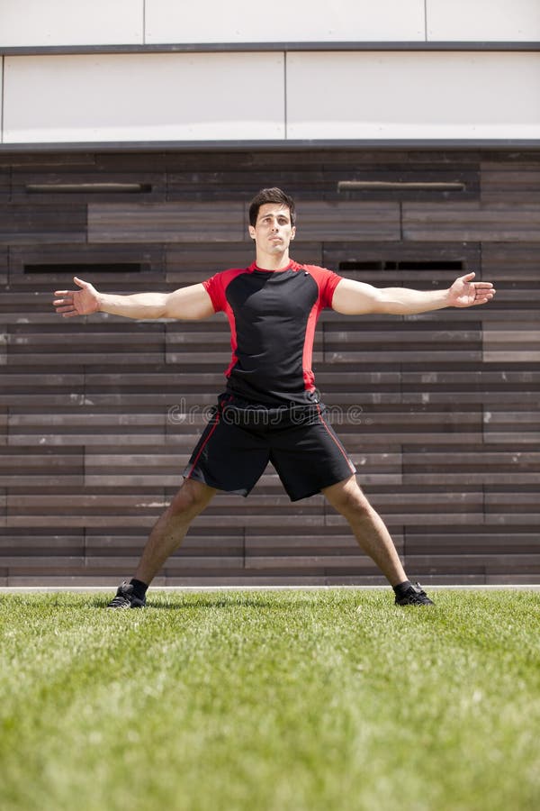 Athlete Warming and Stretching Stock Image - Image of athletic ...