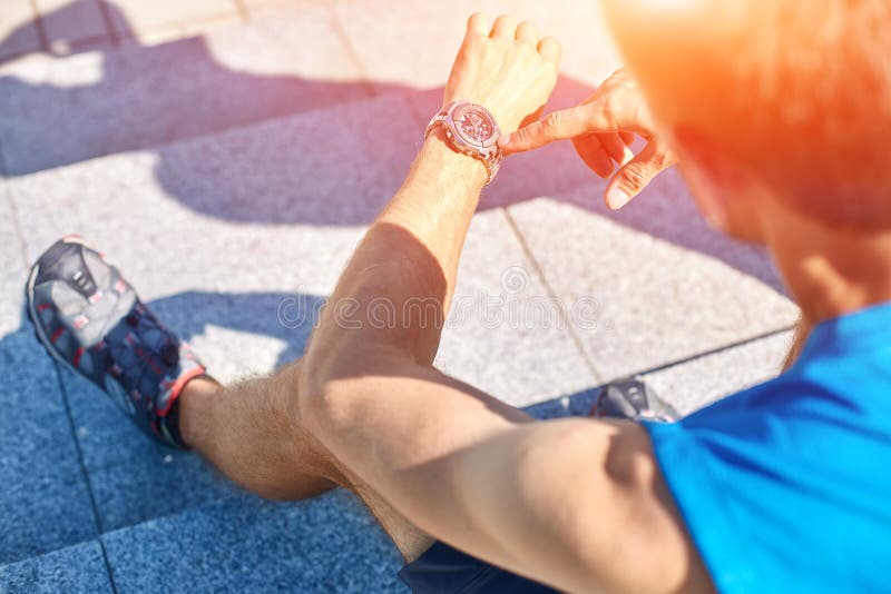 Athlete with watch stock photo. Image of person, gear - 73366434